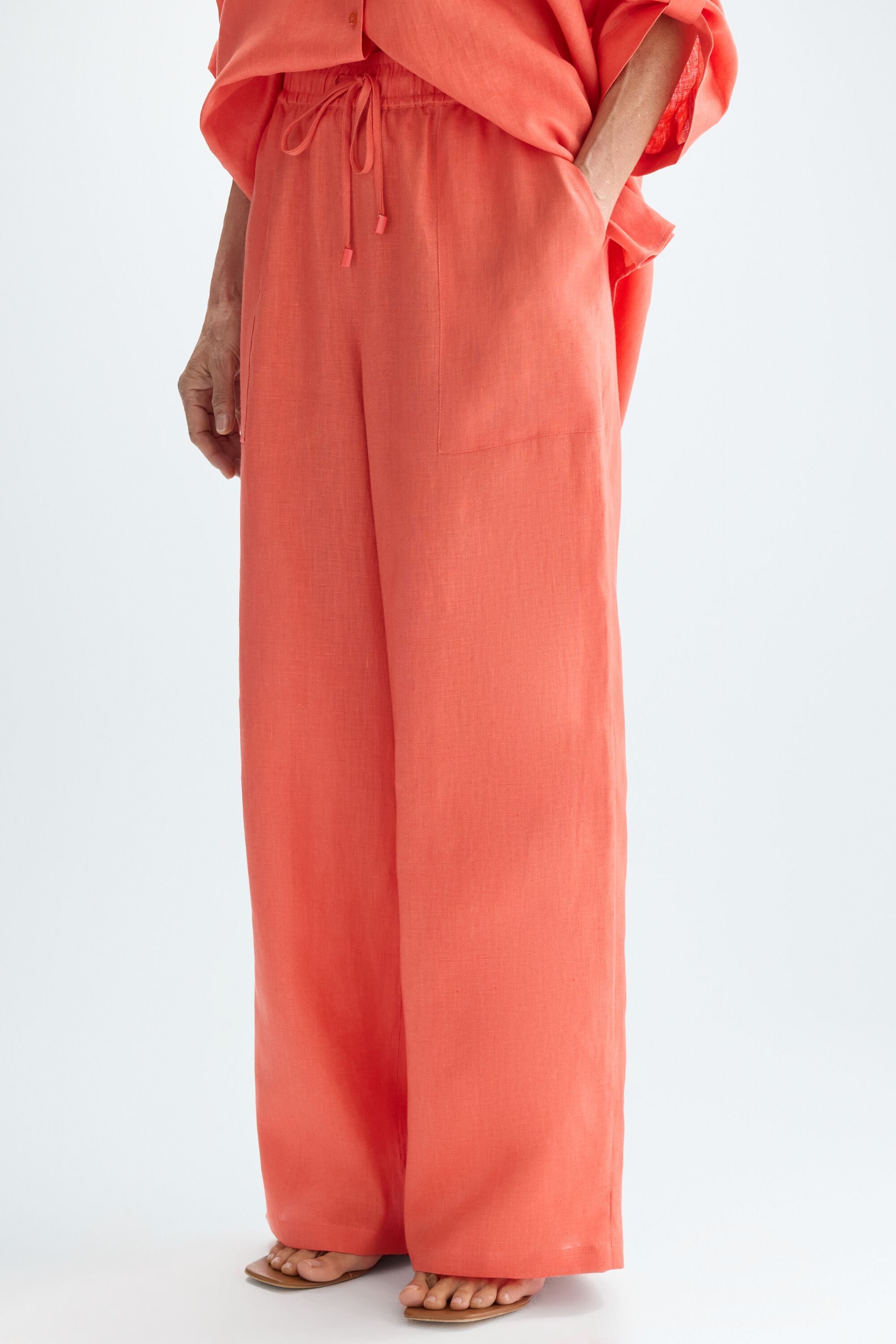 Linen straight-leg pyjama-style trousers coral - Purificacion Garcia ...